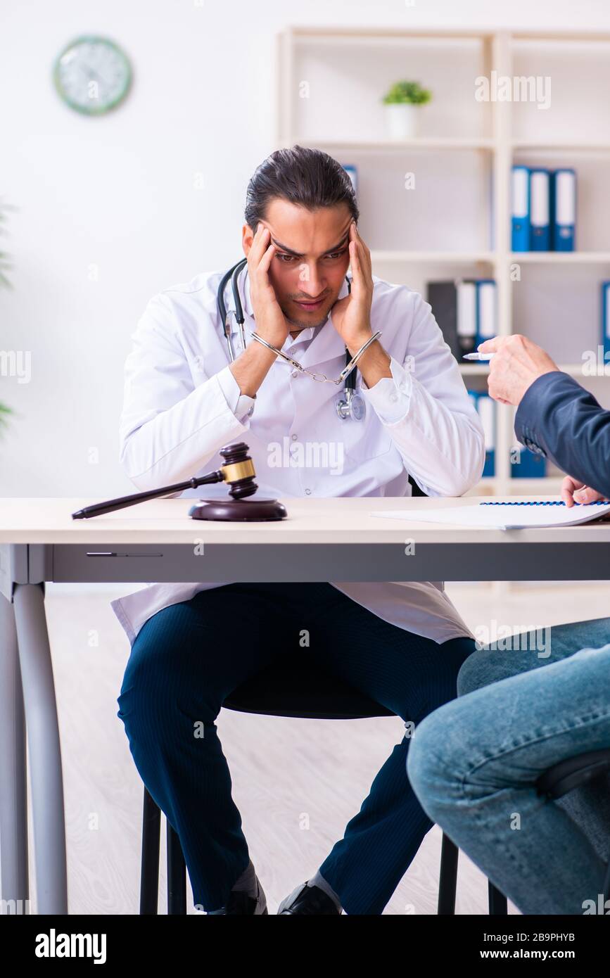 Doctor in courthouse meeting with lawyer Stock Photo - Alamy