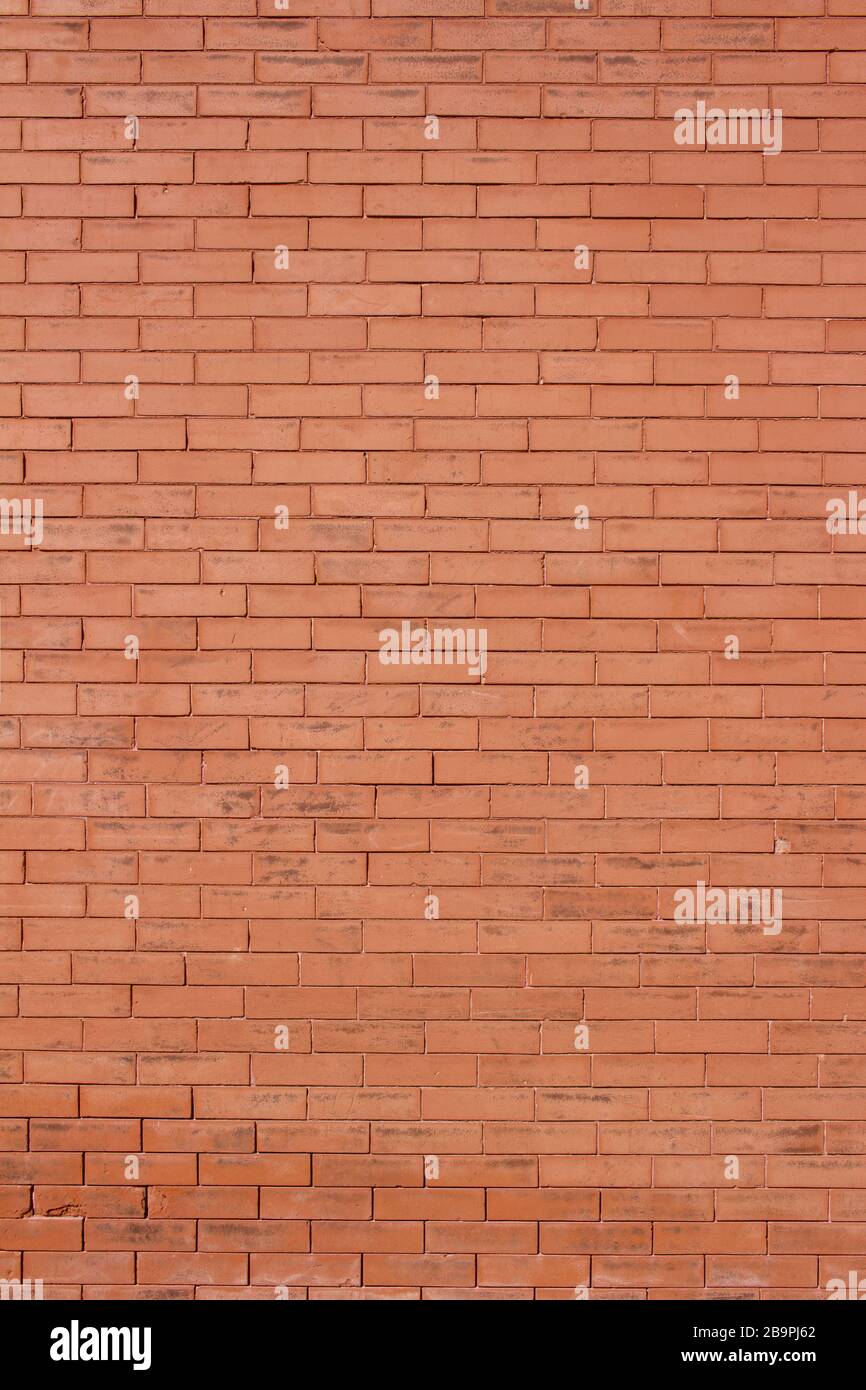Antique burnt orange color brick wall texture background with aging ...