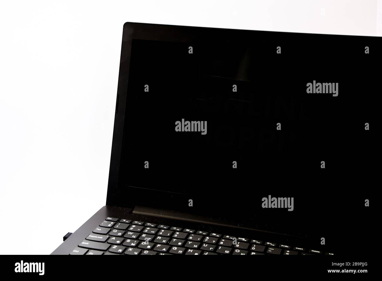 Sleek modern laptop with blank black screen, front view and isolated on ...