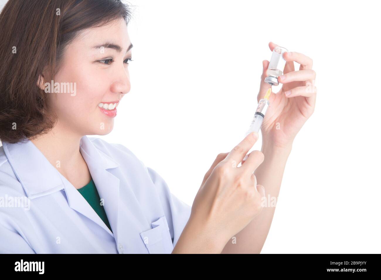 Doctor with medical syringe in hands, getting ready for injection Stock ...