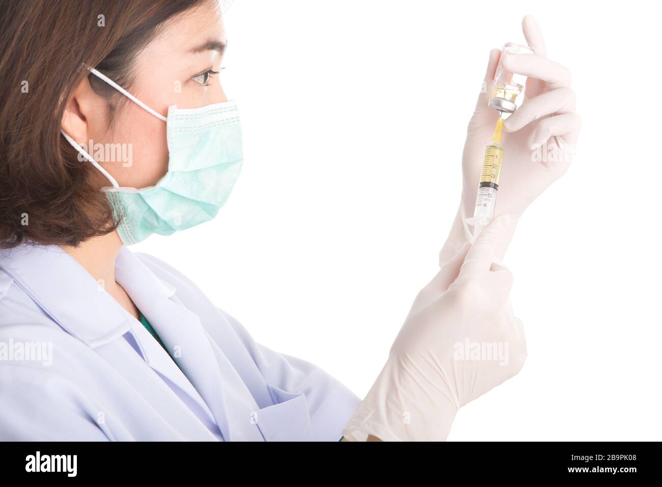 Doctor with medical syringe in hands, getting ready for injection Stock ...