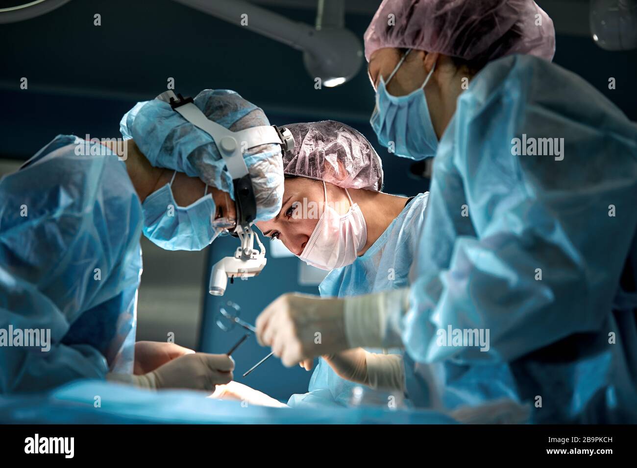 A shot of an emergency and a serious accident in the operating room, a ...