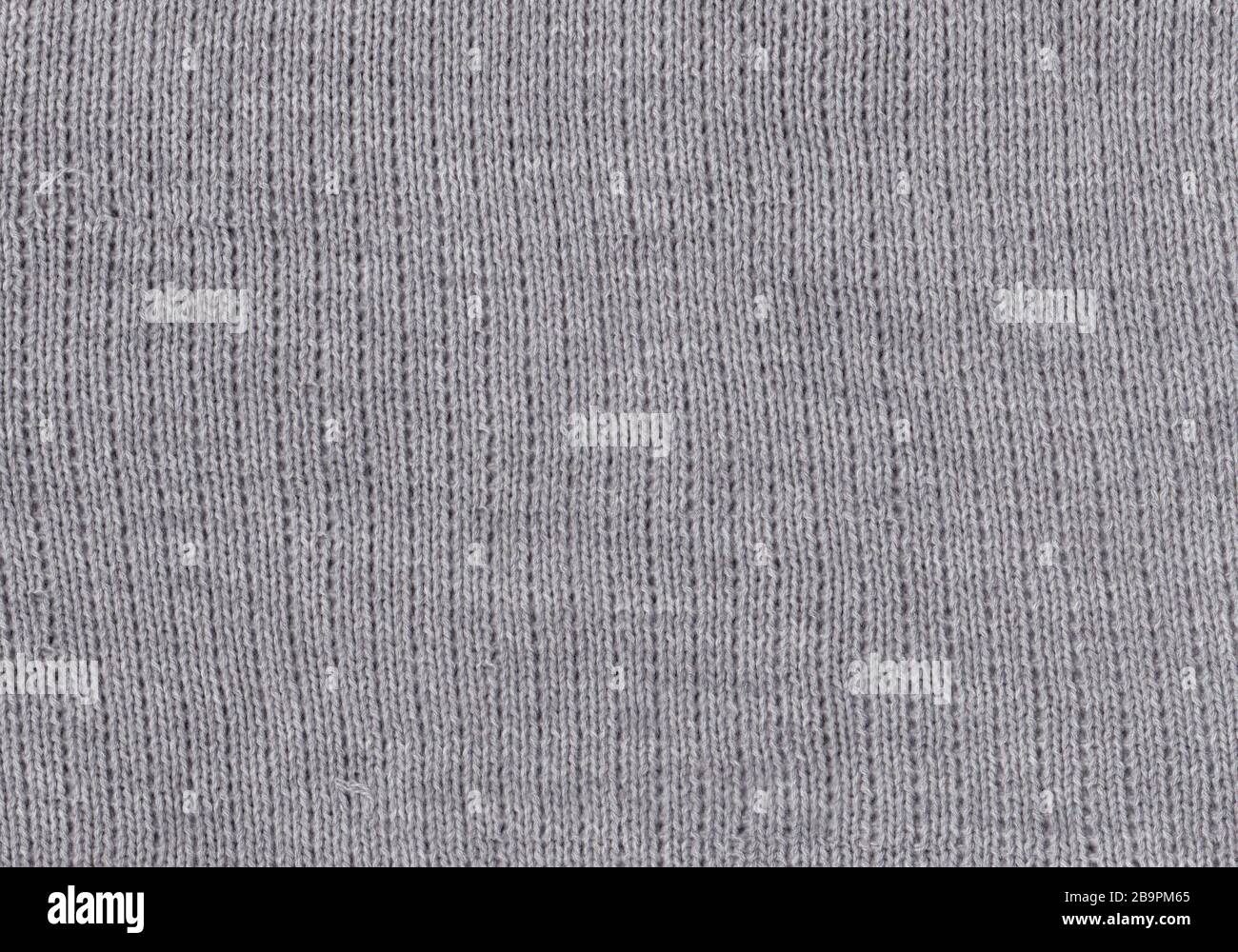 Knitted gray wallpaper and an abstract background Stock Photo - Alamy