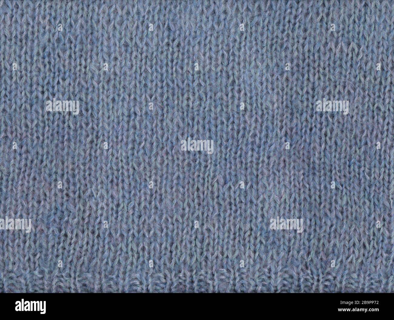 Sweater made of wool. Texture of knitted fabric. Cold weather ...