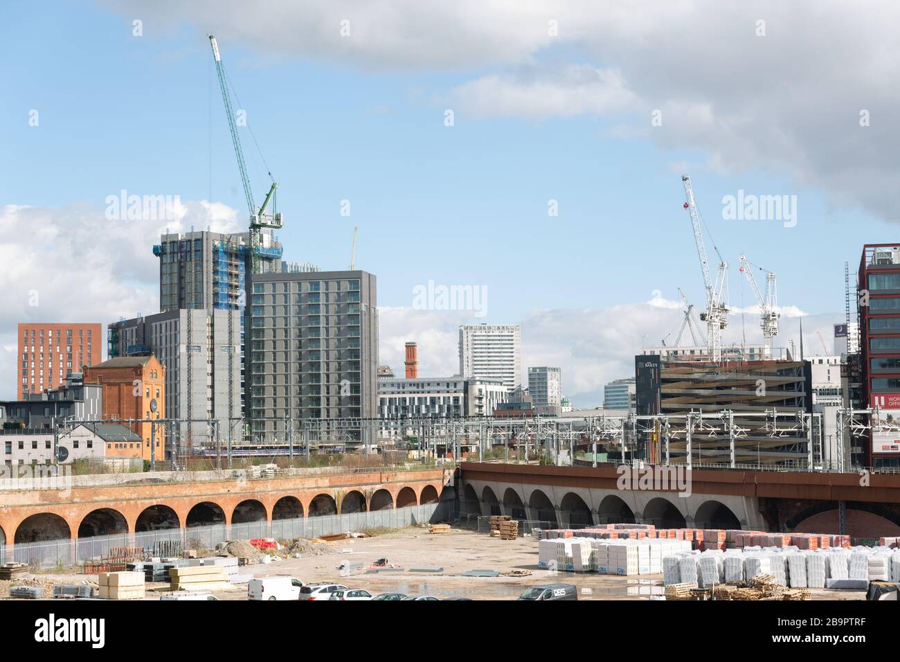 Manchester City Centre, construction high rise buildings and train ...