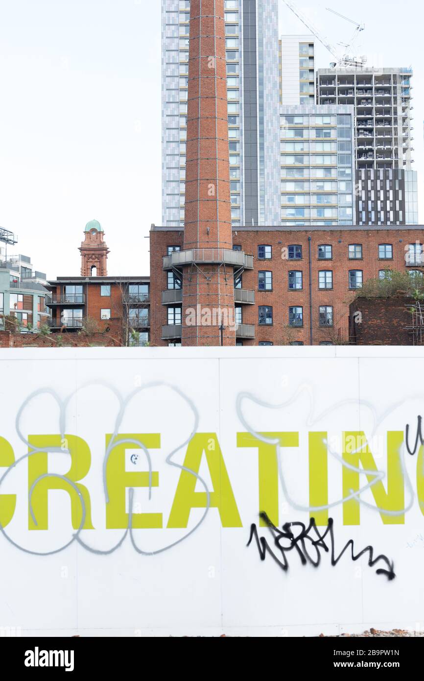 Manchester Redevelopment, building sight hoarding and modern buildings ...