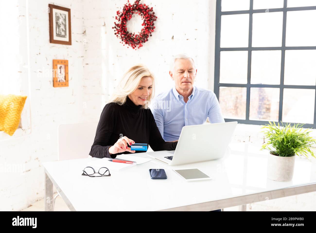 Senior woman computer from behind hi-res stock photography and images ...