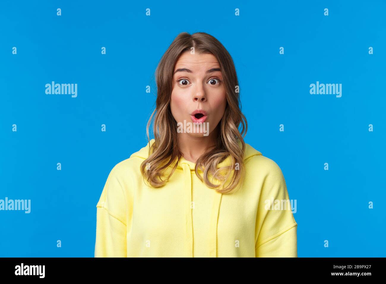 Close-up portrait of intrigued and curious good-looking young teenage ...