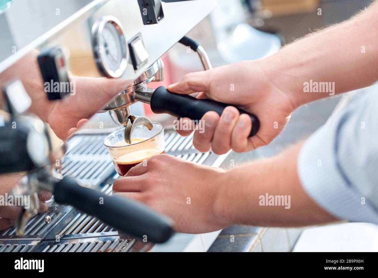 Barista espresso machine making man employee worker working hi-res ...