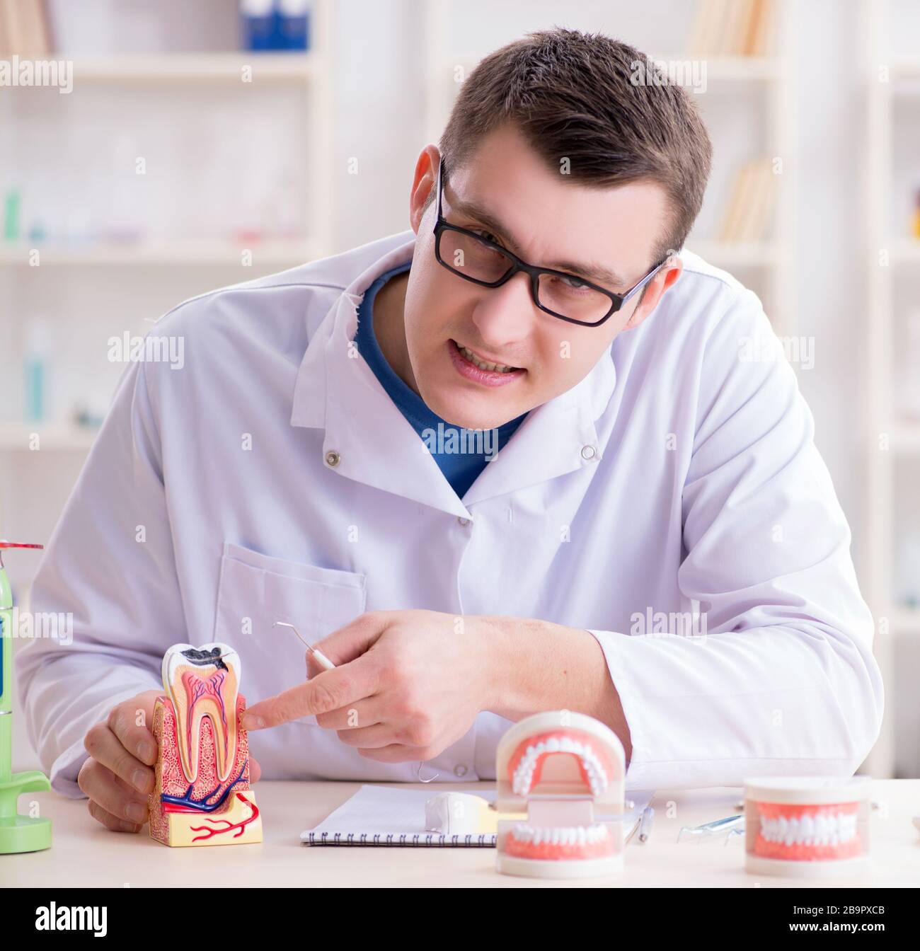 The dentist working teeth implant in medical lab Stock Photo - Alamy