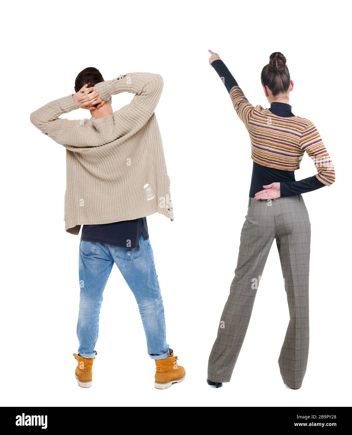 Back view of couple in sweater pointing. Rear view people collection ...