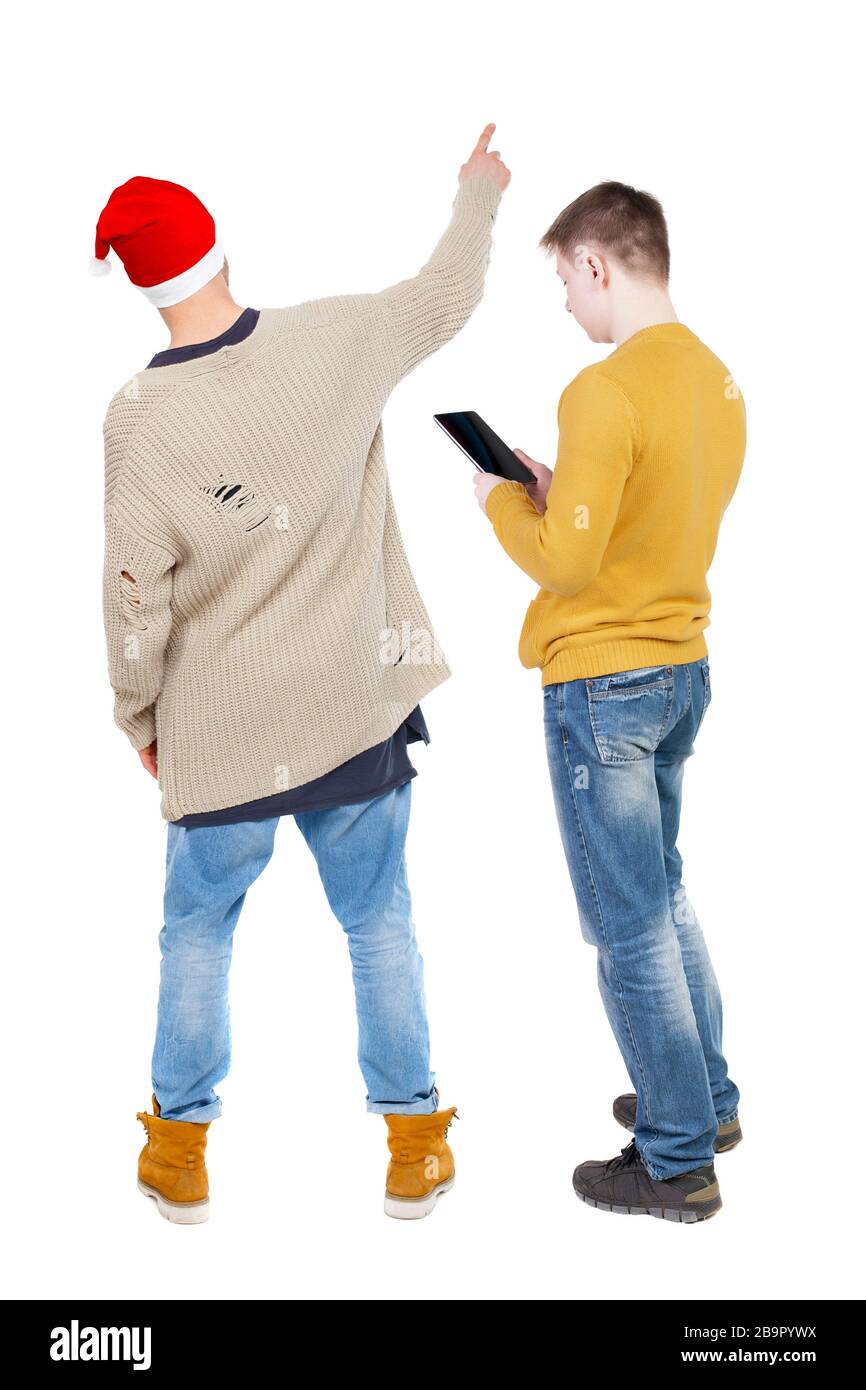 Back view of two man in sweater pointing. Rear view people collection ...