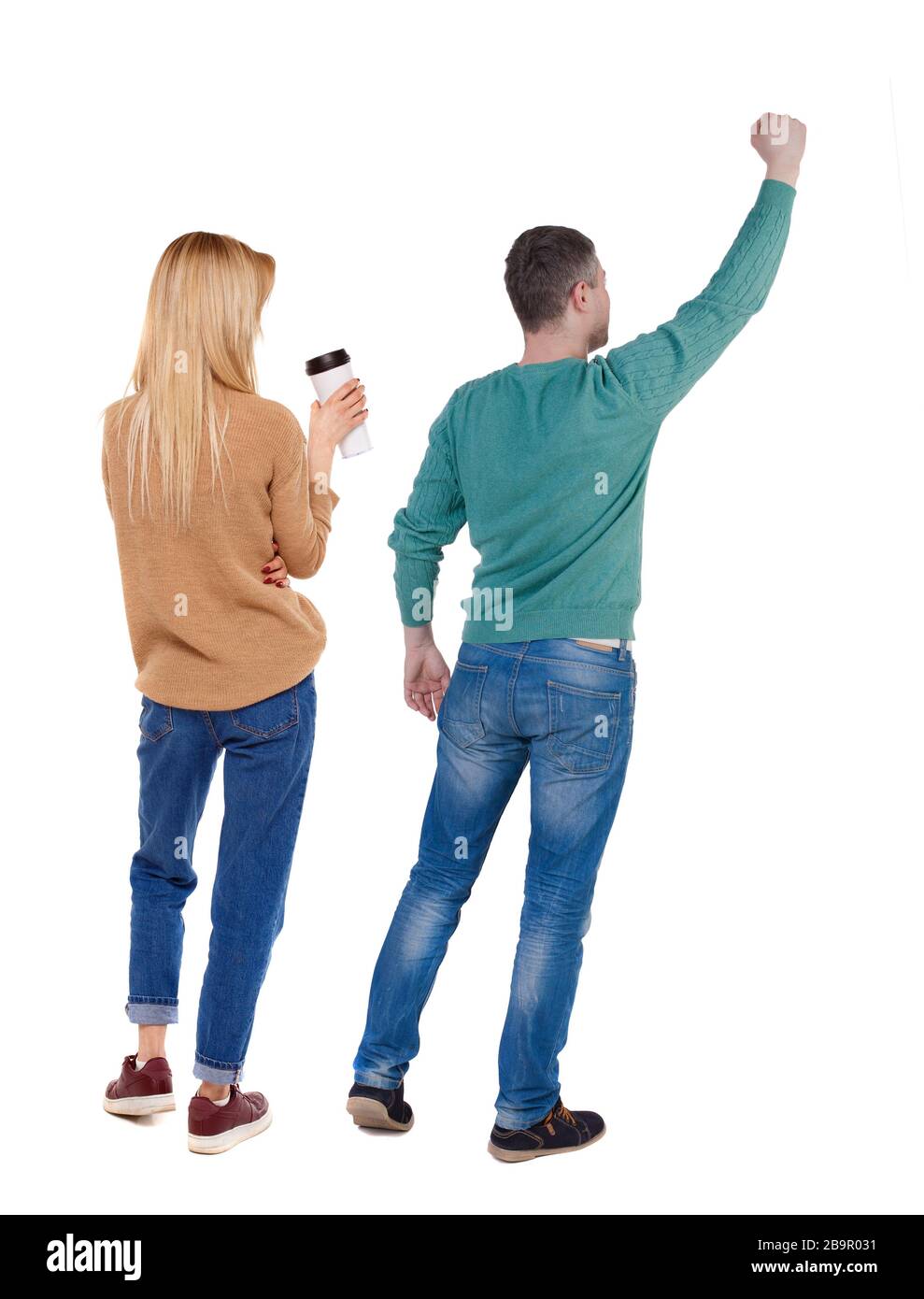 Back view couple in sweater. beautiful man and woman. Rear view people ...