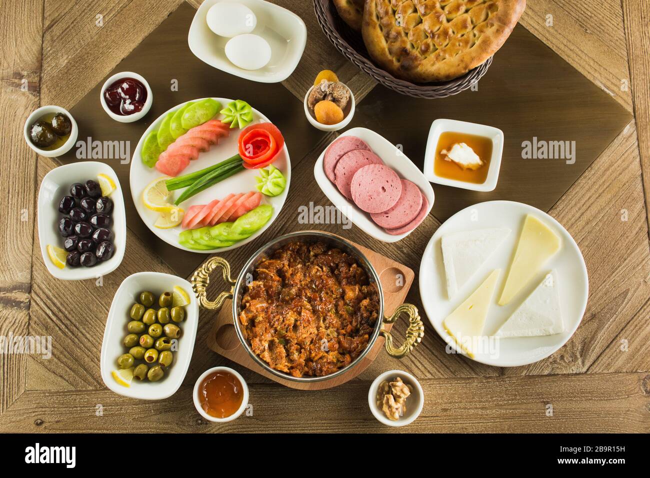 Traditional Turkish Breakfast with sesame bagel and fry egg with ...