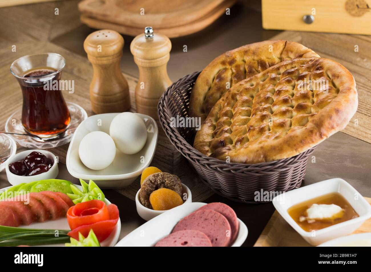 Traditional Turkish Breakfast with sesame bagel and fry egg with ...