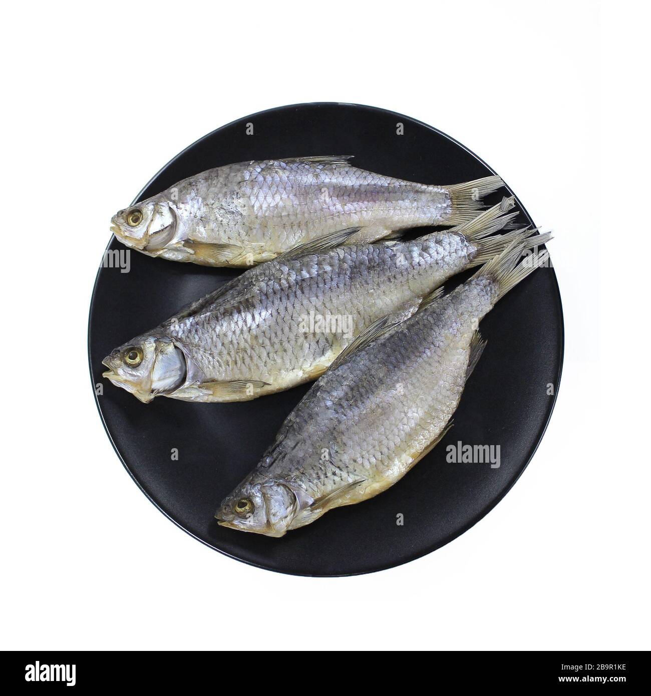 Whole dried salted fish. Beer snack. Isolated over white background ...