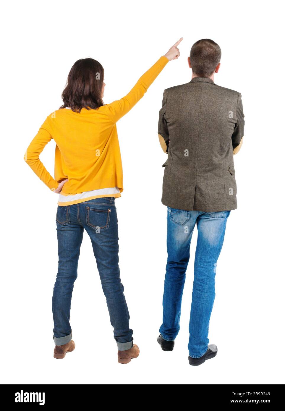 Back view of couple in sweater pointing. Rear view people collection ...