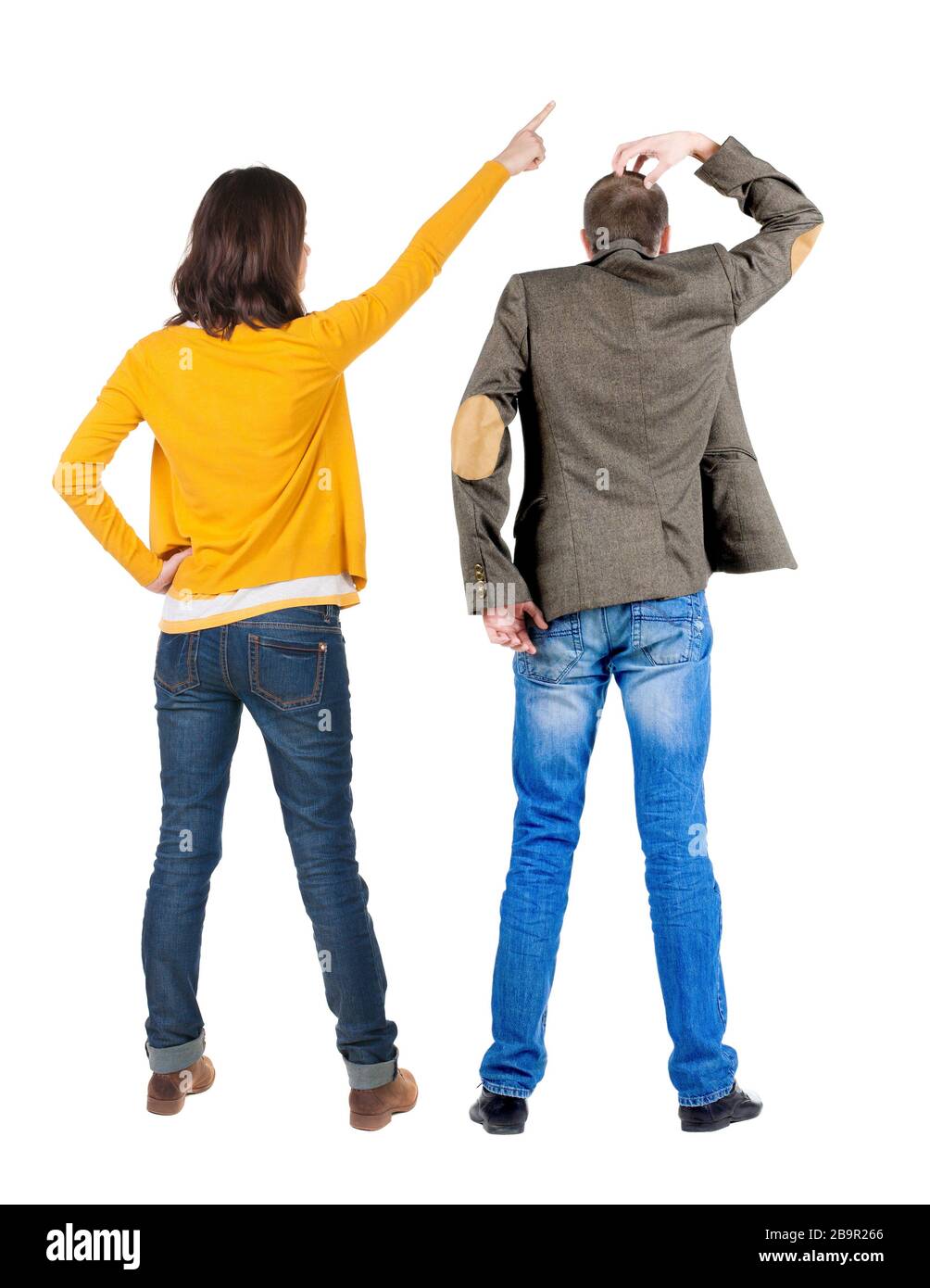 Back view of couple in sweater pointing. Rear view people collection ...