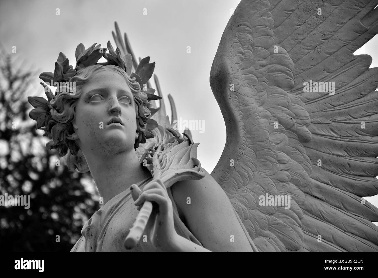 Angel looking back Stock Photo - Alamy