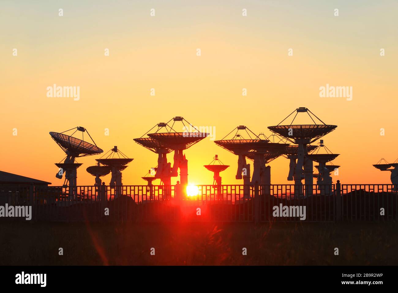 The observatory's radio telescope in the morning, the silhouette of the ...