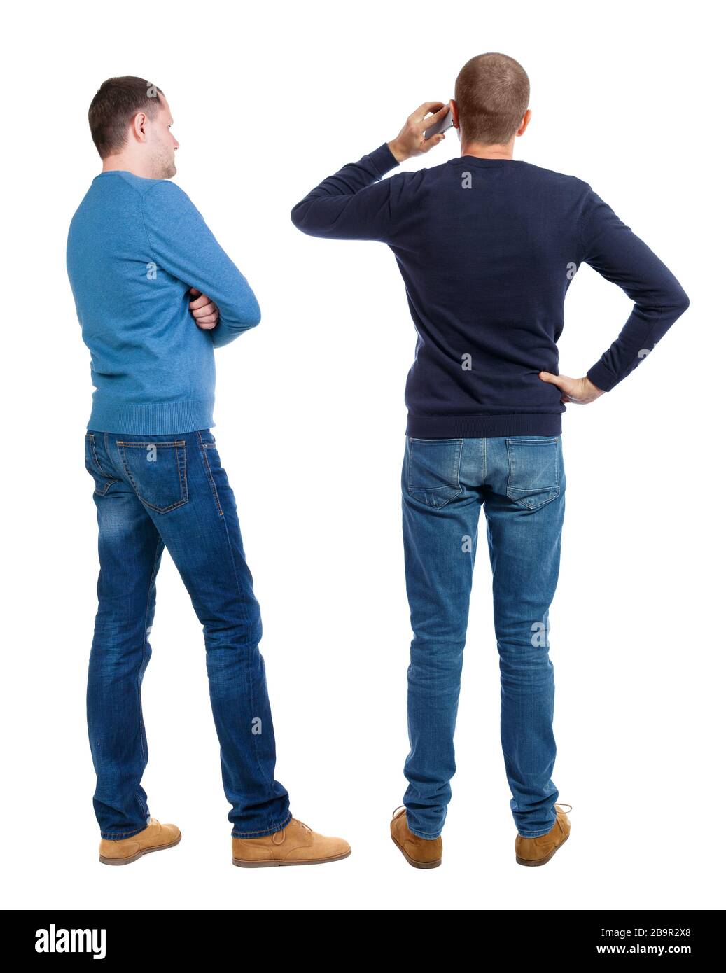 Back view of two man in sweater with mobile phone. Rear view people ...