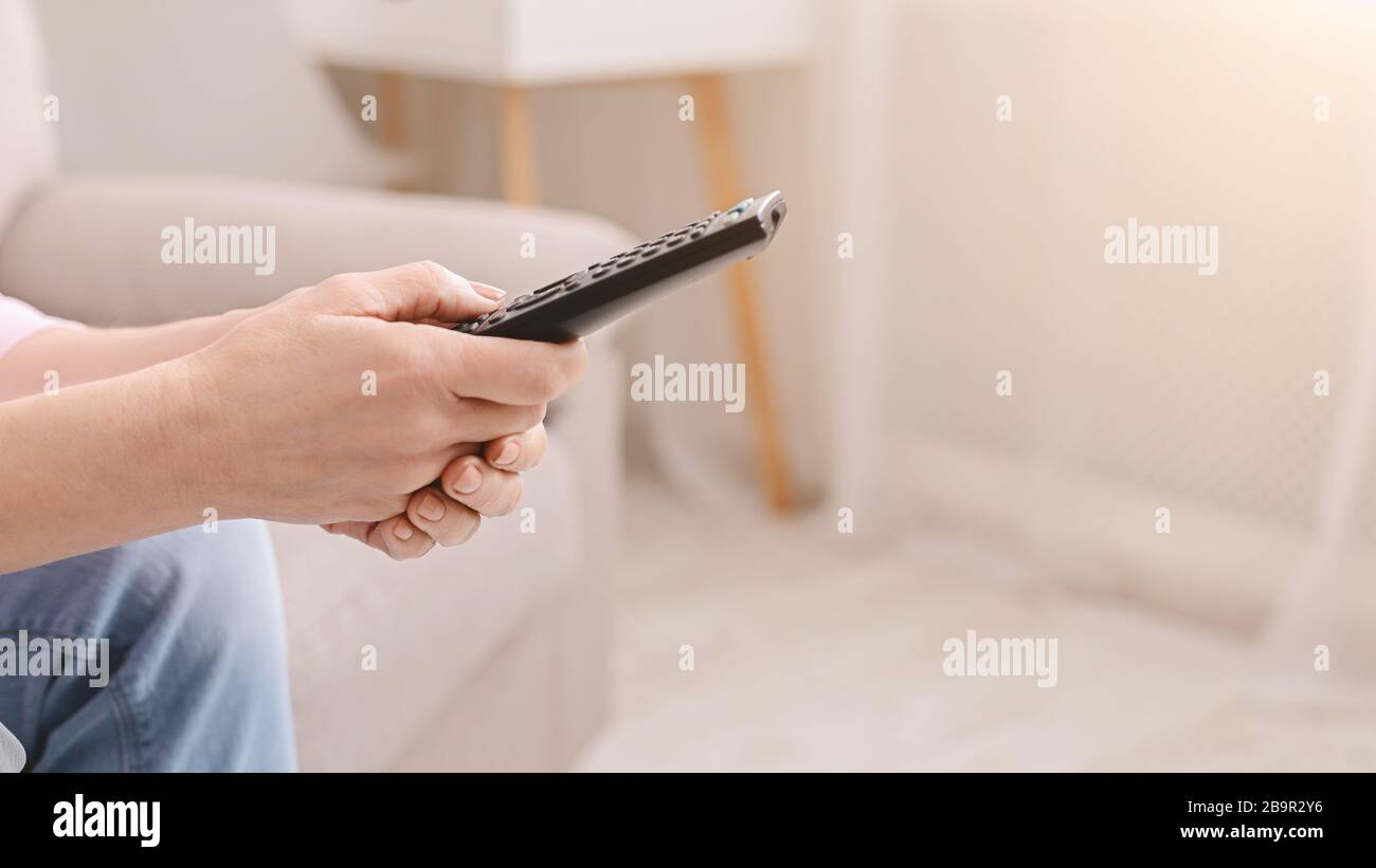 Senior woman remote control hi-res stock photography and images - Alamy