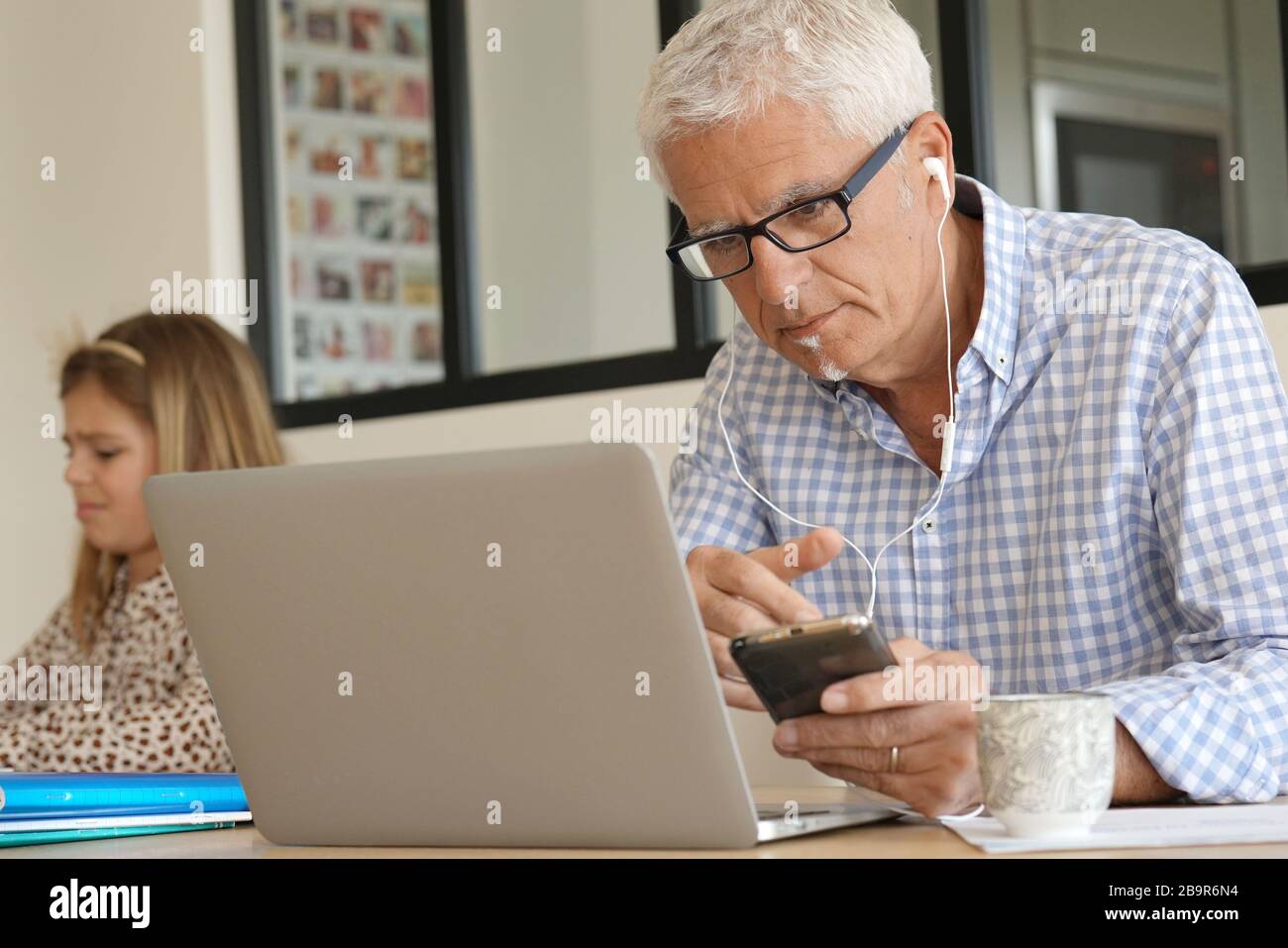 senior man working on his computer at home Stock Photo - Alamy
