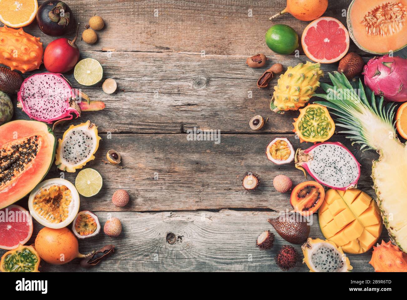 Tropical fruits concept. Exotic fruits - pineapple, papaya, mango ...