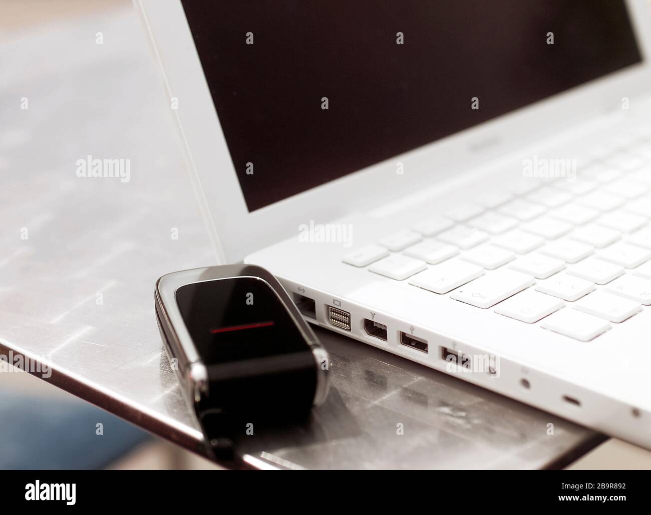 portable computer and mobile phone Stock Photo - Alamy