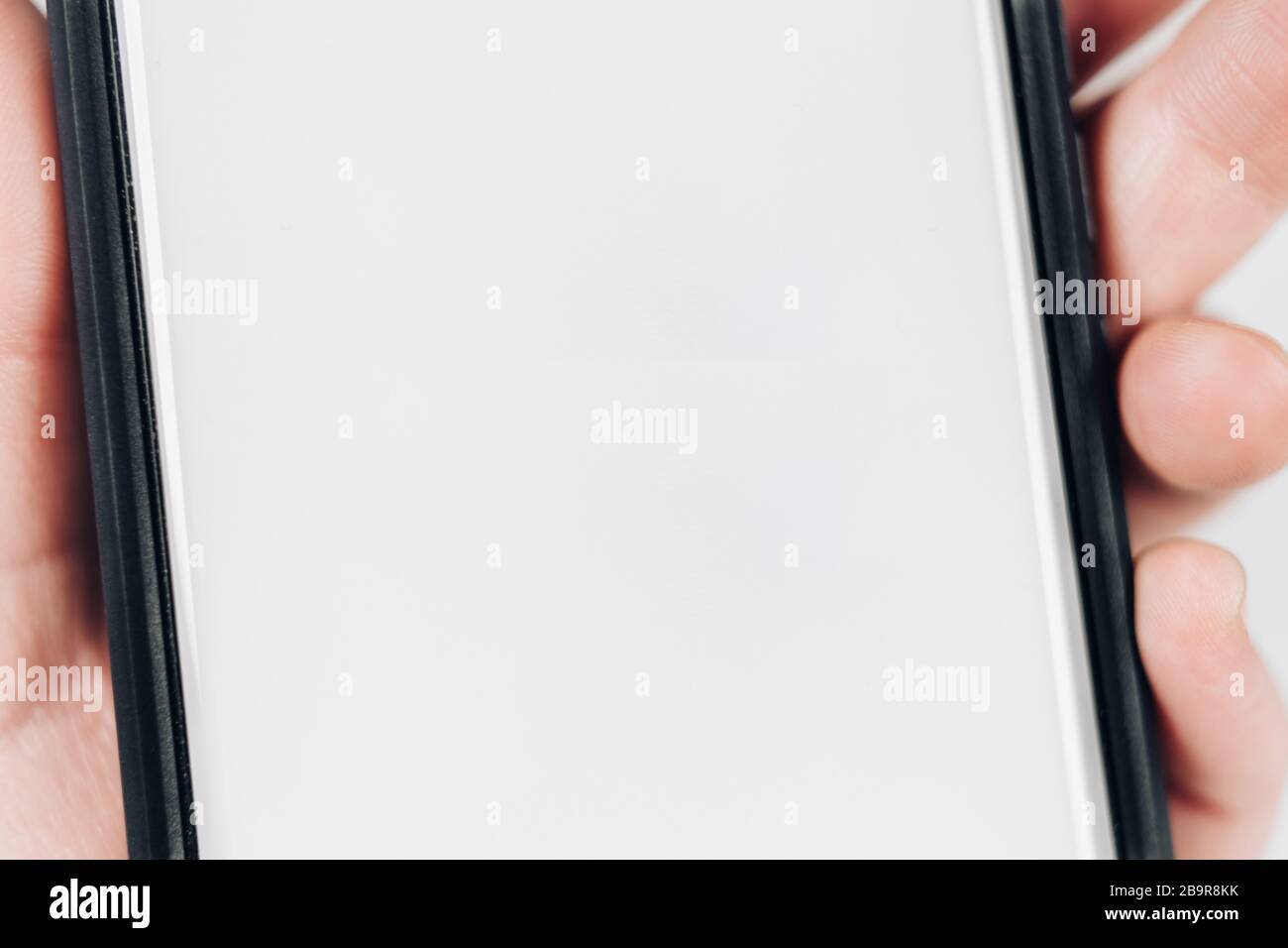 Hand Holding Smartphone - Close Up Showing Blank White Screen Stock ...