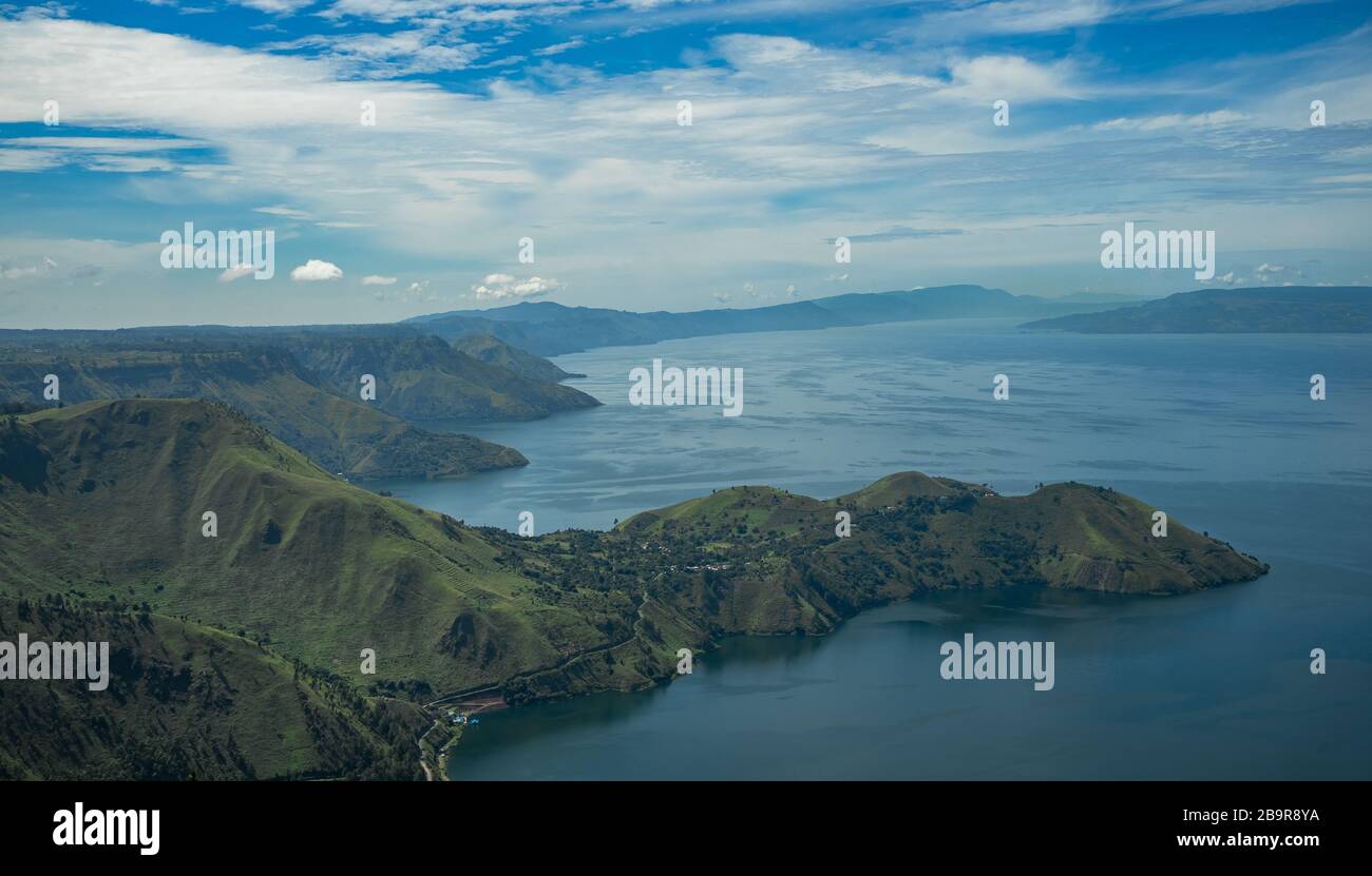 Sunrise at massive lake Toba a caldera of supervolcano a landmark ...