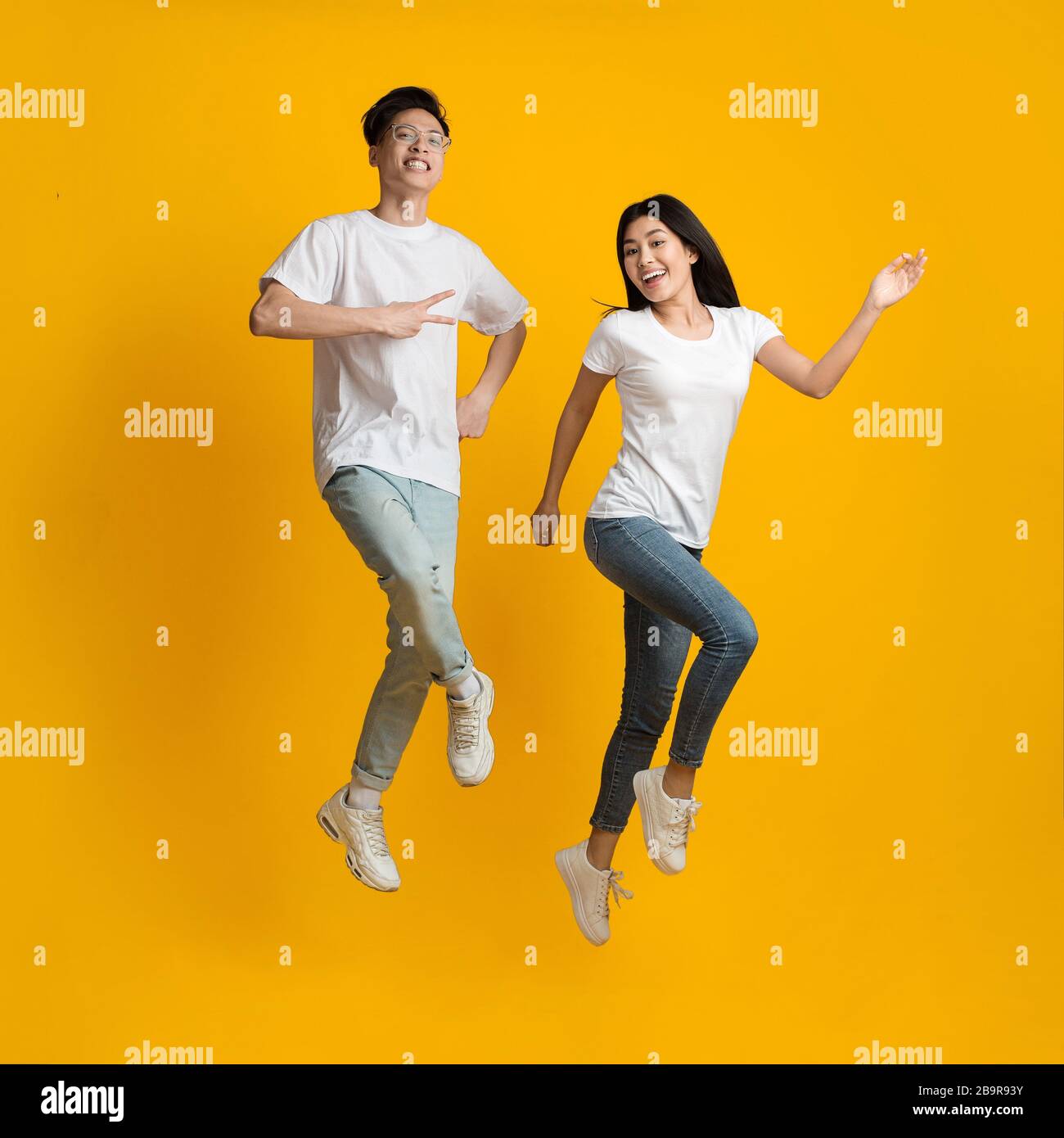 Young Woman Jumping Happily High Resolution Stock Photography and ...