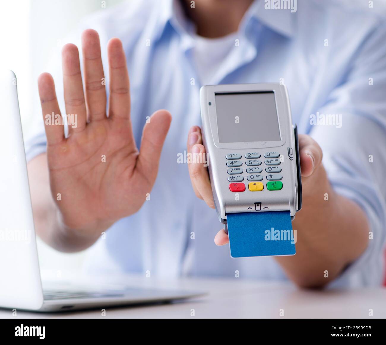 The man processing credit card transaction with pos terminal Stock ...