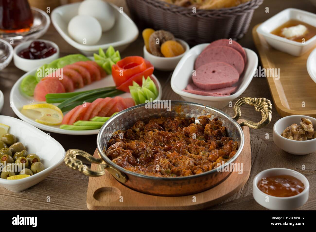 Traditional Turkish Breakfast with sesame bagel and fry egg with ...