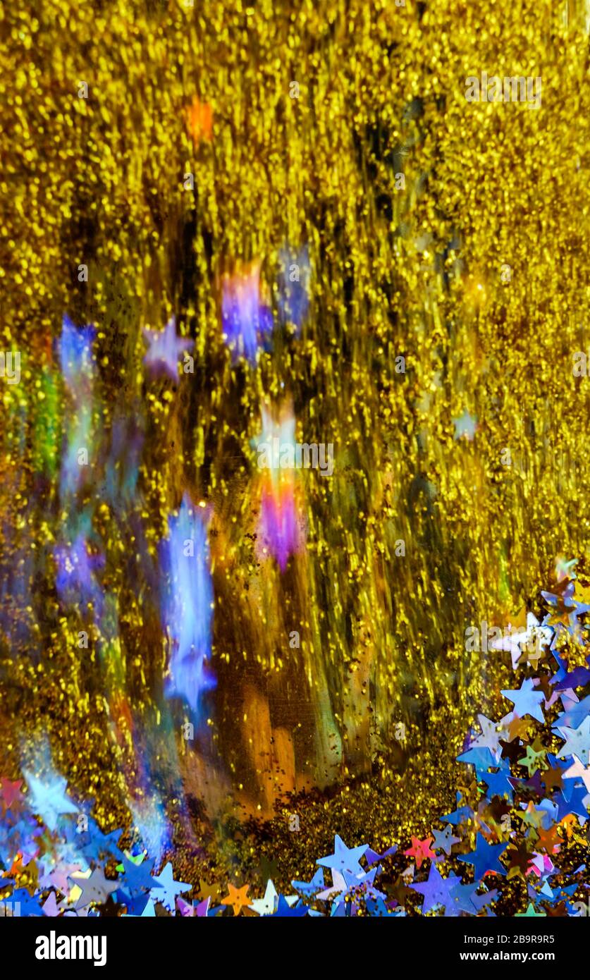 Abstract falling stars and golden sparkles, motion blur Stock Photo - Alamy
