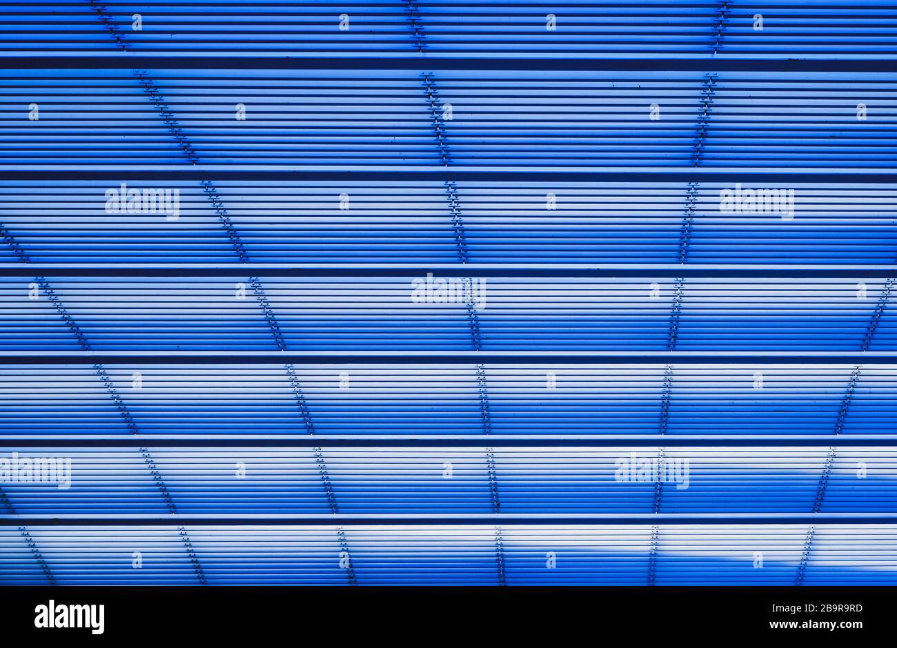 abstract parallel lines with blue light, metal blinds Stock Photo - Alamy