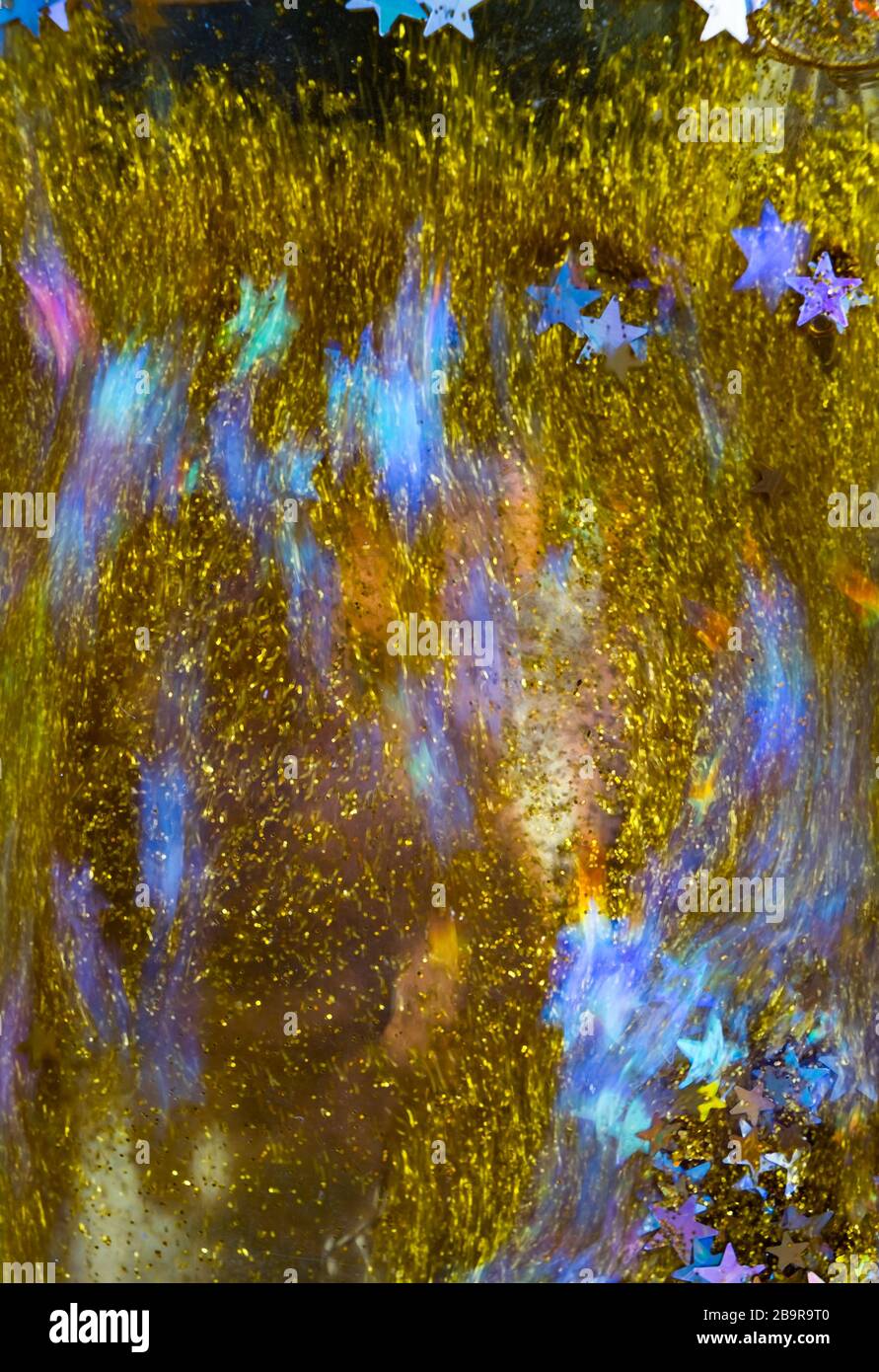 Abstract motion blur falling stars and golden sparkles Stock Photo - Alamy