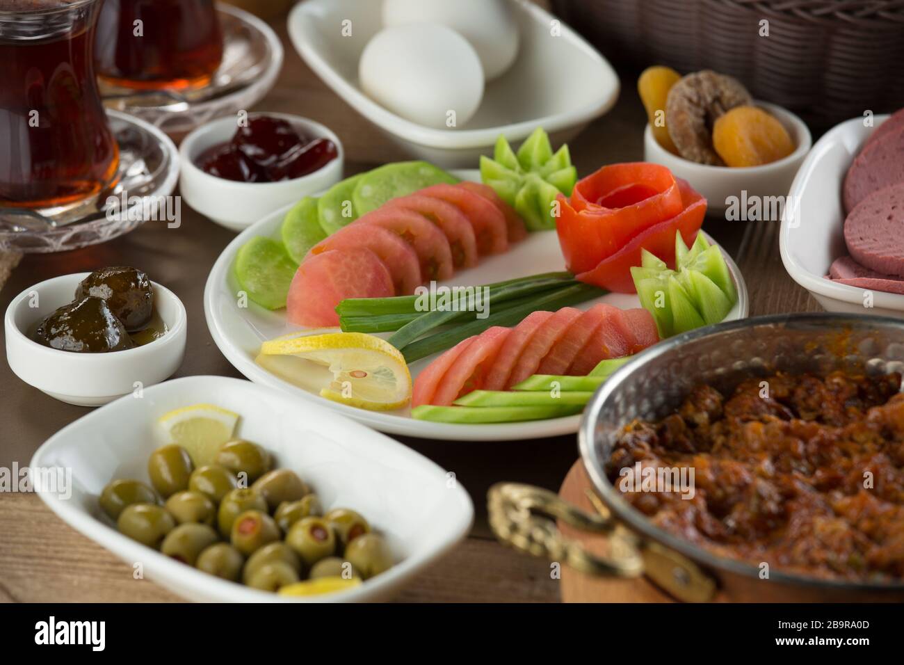 Traditional Turkish Breakfast with sesame bagel and fry egg with ...