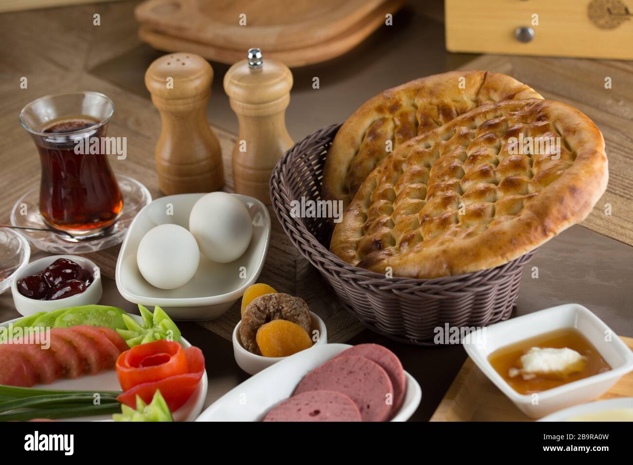 Traditional Turkish Breakfast with sesame bagel and fry egg with ...