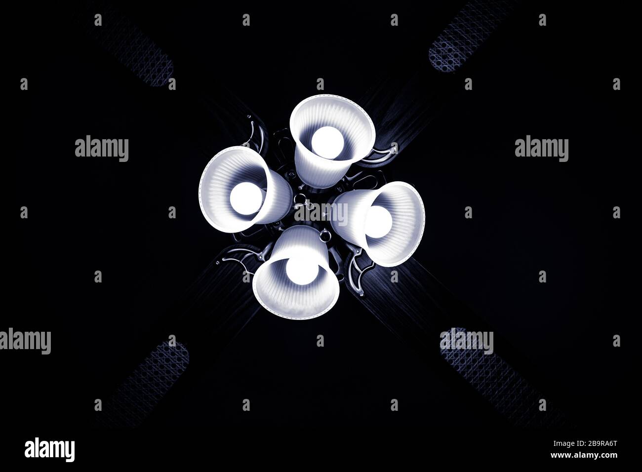 bottom up view of ceiling fan with lights Stock Photo - Alamy