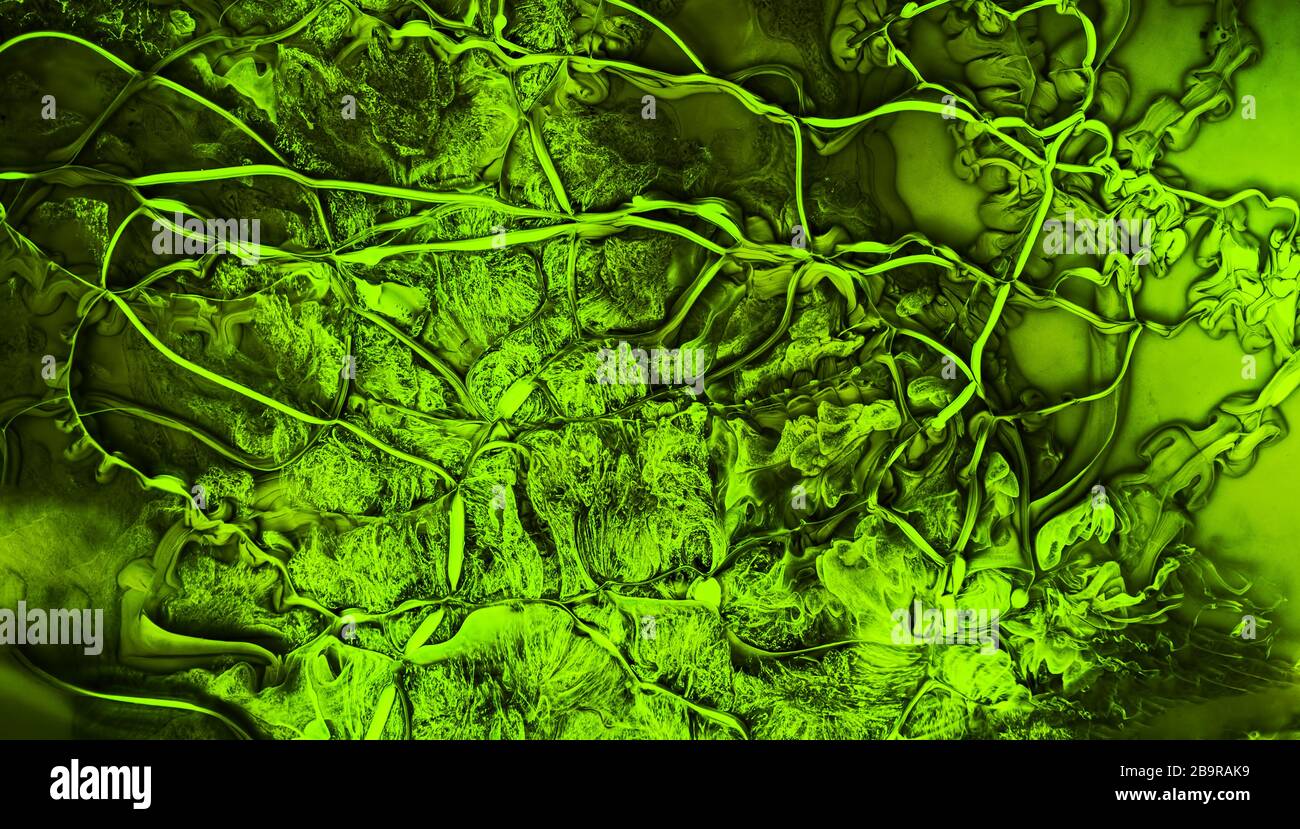 green oil paint mixed flows texture Stock Photo - Alamy