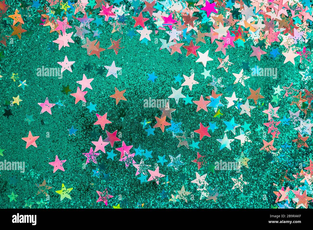 green sparkles and multicolour stars background Stock Photo - Alamy