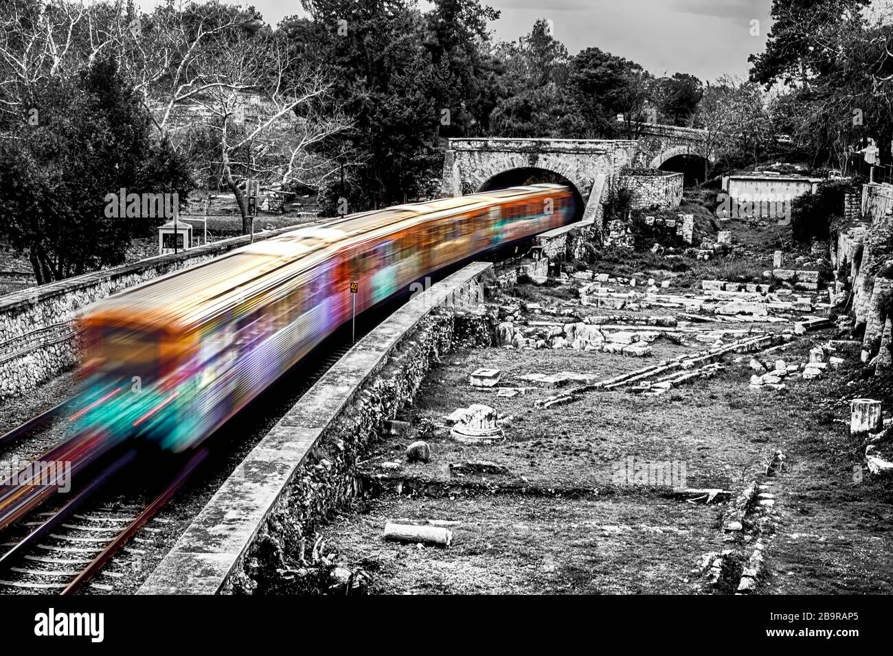 a train passes through the ruins Stock Photo - Alamy