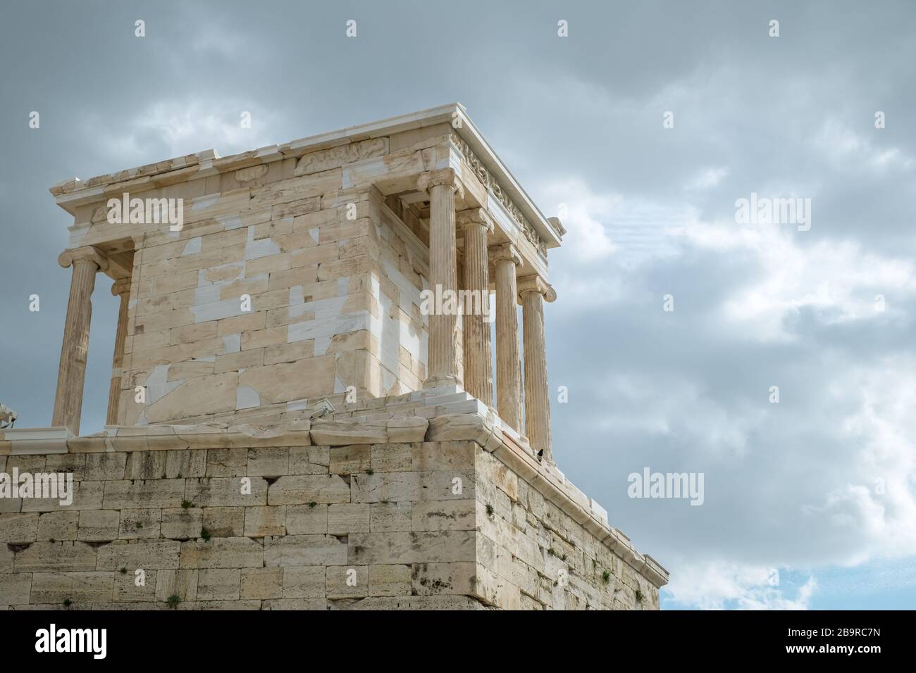 Athens, Greece - February 13, 2020. Ruins of Propylaea -monumental gateway in the Acropolis of ...