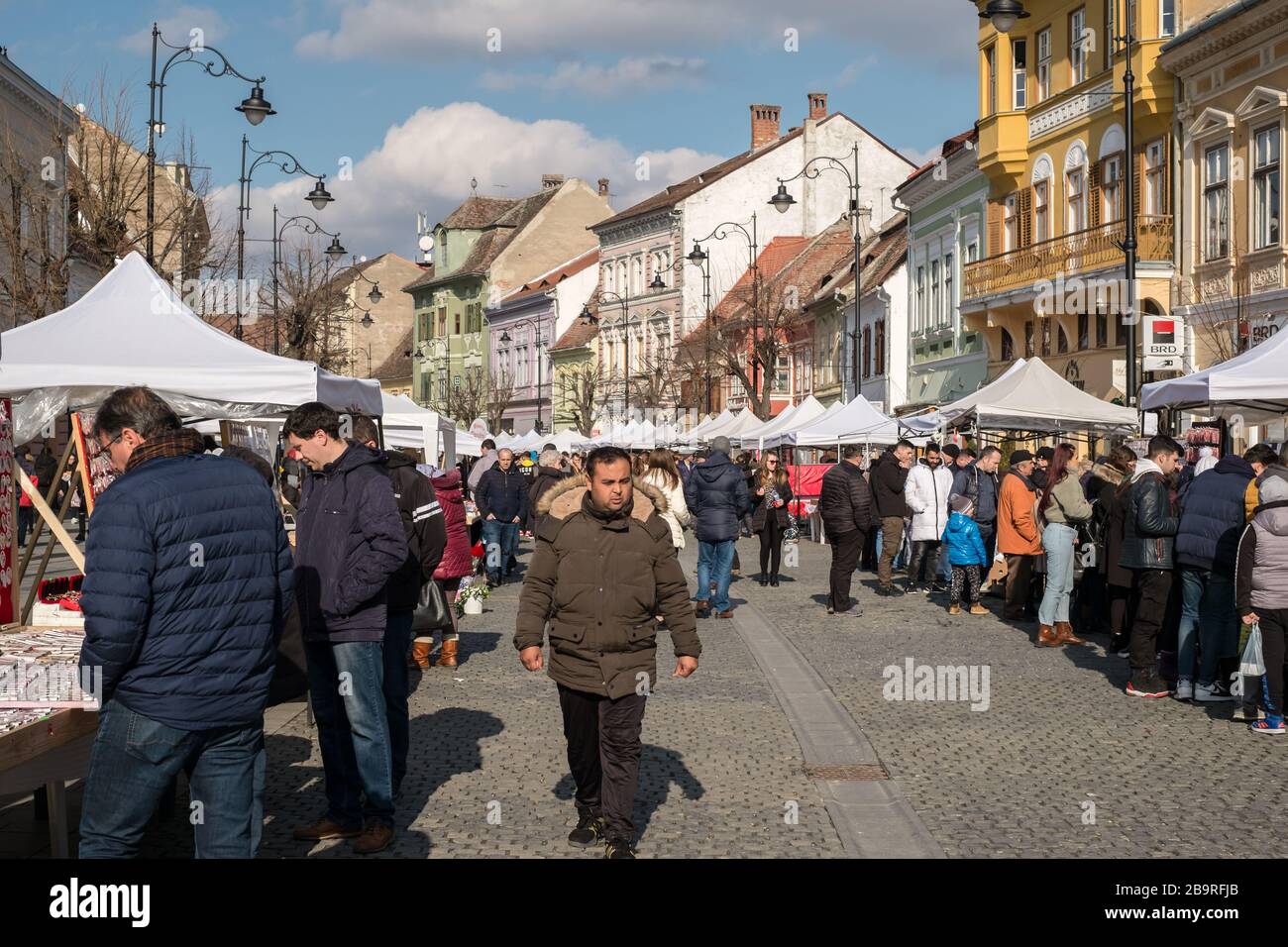 Sibiu city, Romania - February 29, 2020. People look at martisor at big ...