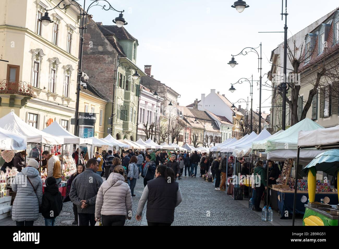 Sibiu city, Romania - February 29, 2020. People look at martisor at big ...