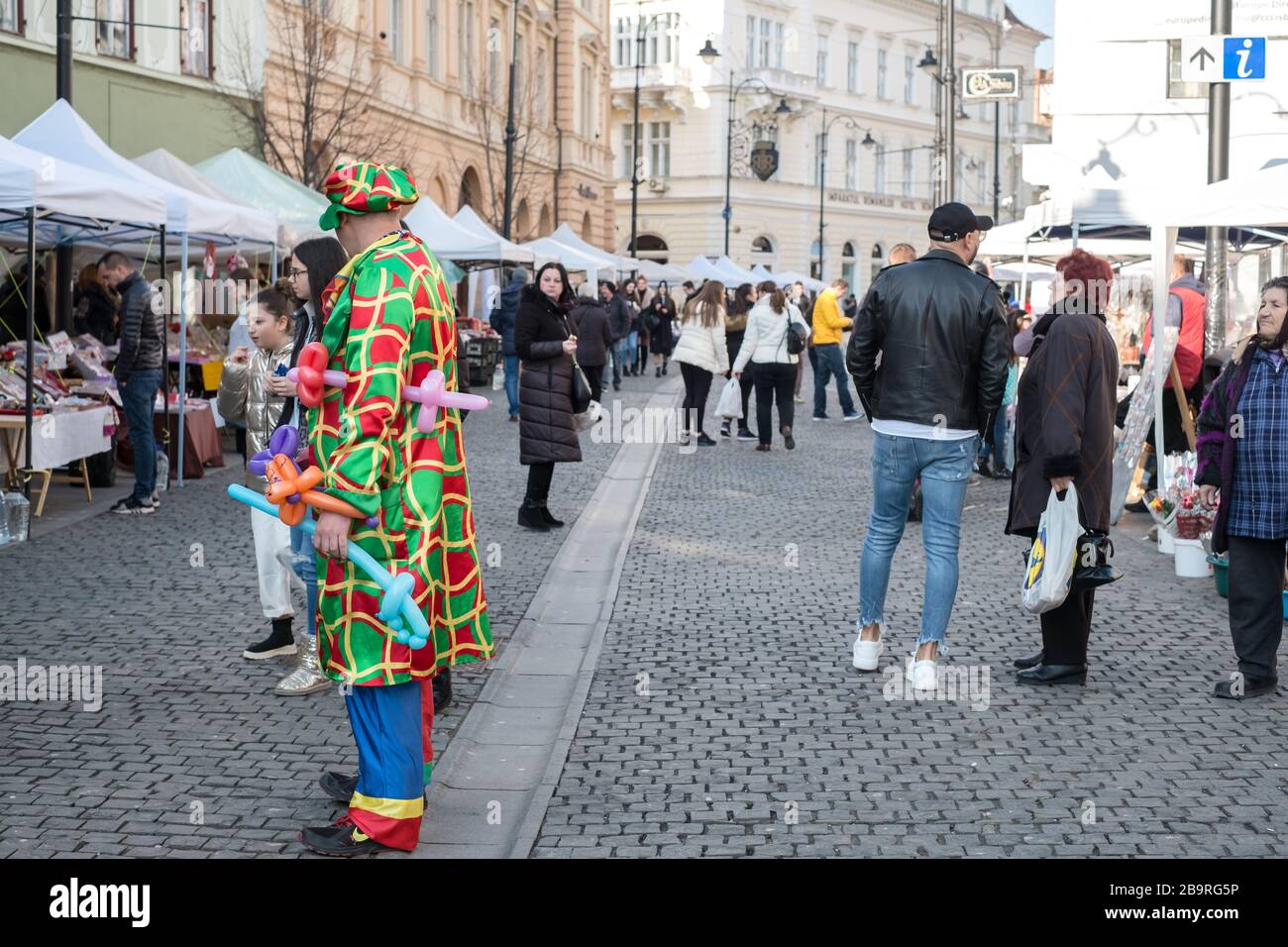 Sibiu city, Romania - February 29, 2020. People look at martisor at big ...