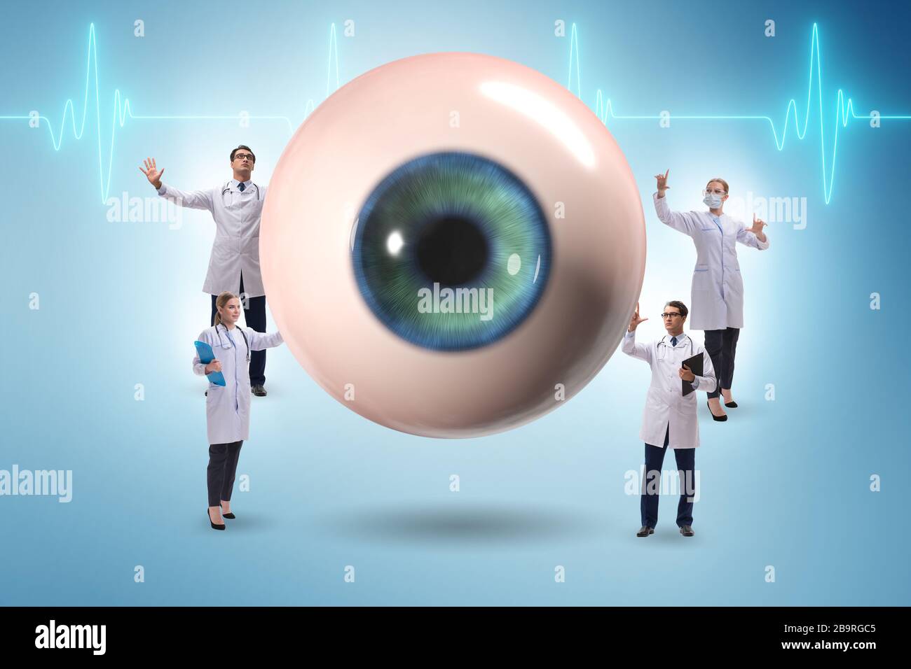 The doctor examining giant eye in medical concept Stock Photo - Alamy