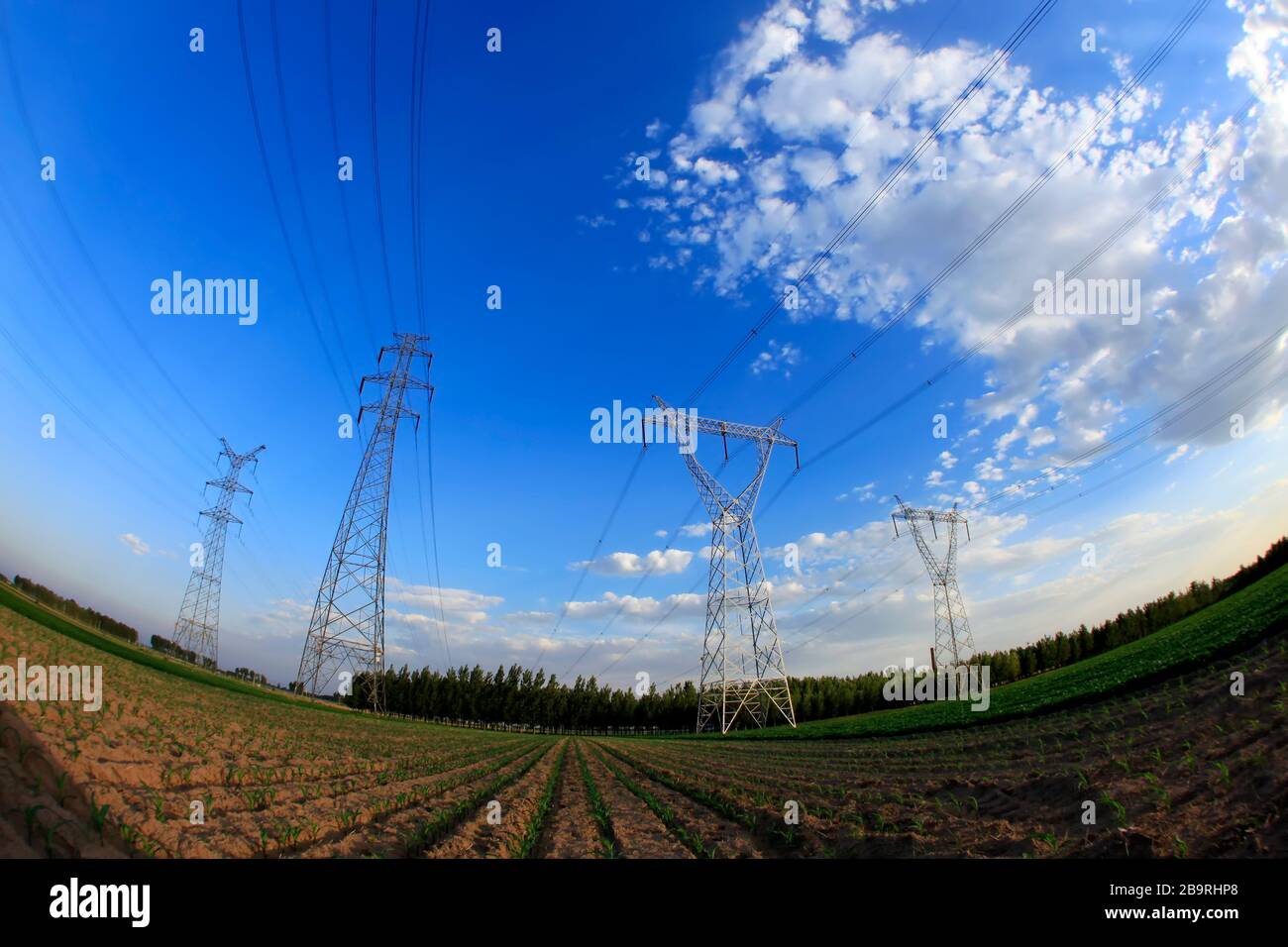 Pylon, the pylon under the blue sky white clouds Stock Photo - Alamy