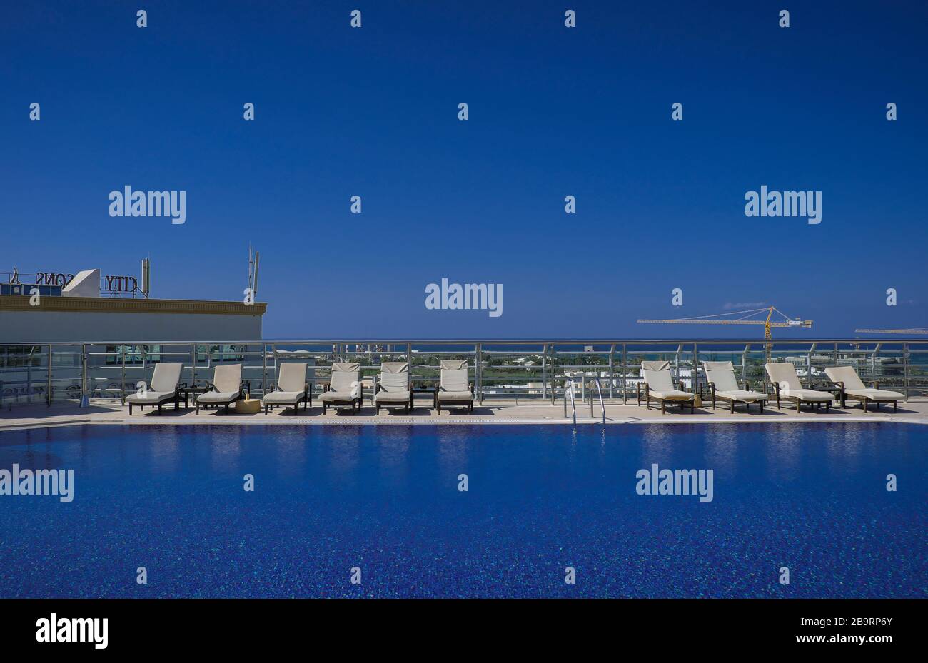 muscat pool view Stock Photo - Alamy